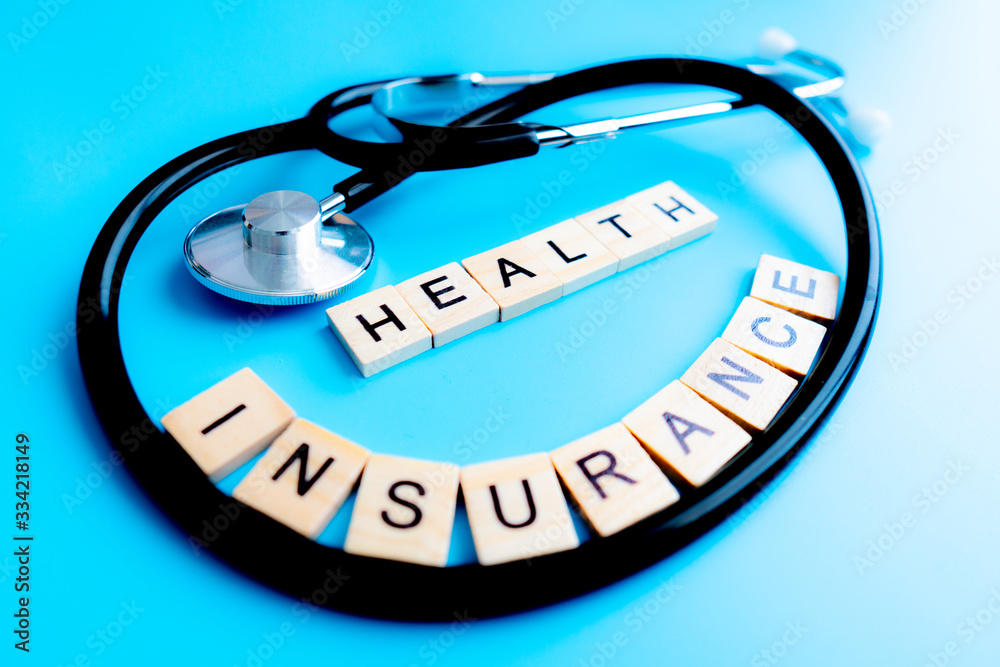 Health insurance word with stethoscope - health concept. Medical ...