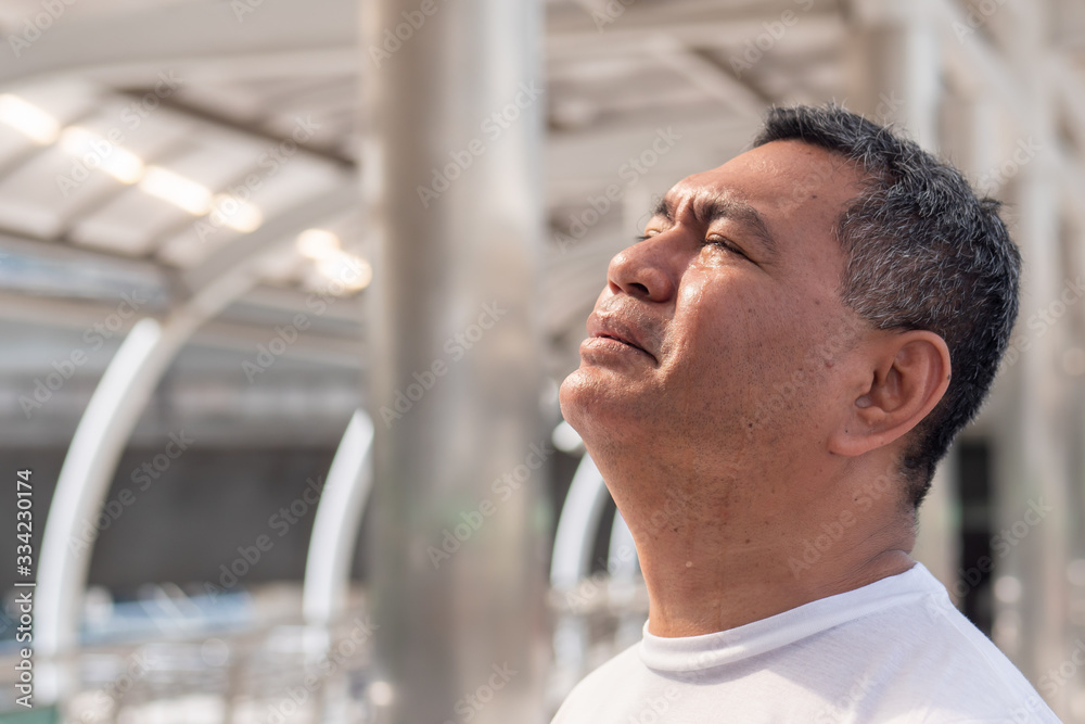 sad old senior man crying; portrait of asian man in senior uncle age ...