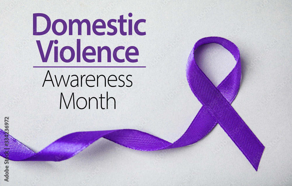 Purple ribbon on grey background, top view. Symbol of Domestic Violence ...