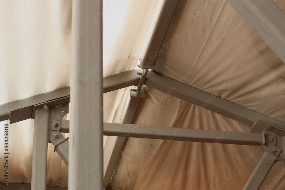 Steel rafter system. Roof frame of a building under construction ...