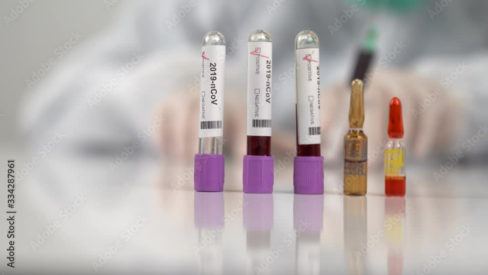 Scientists test lab rat, mouse with syringe. Scientist and lab rat Back ...