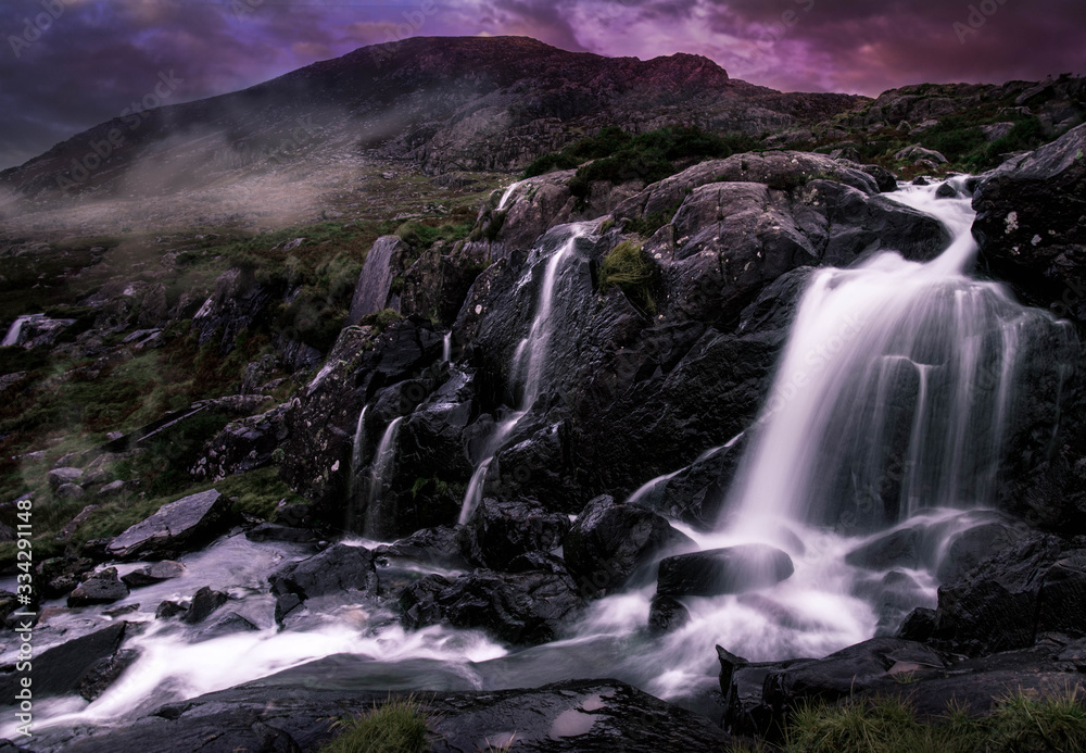 Snowdonia National Park sunrise, waterfall cascades with views of Afon ...