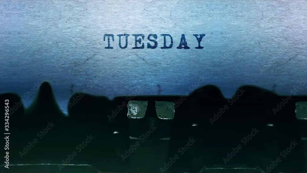 Tuesday Word closeup Being Typing and Centered on a Sheet of paper on ...