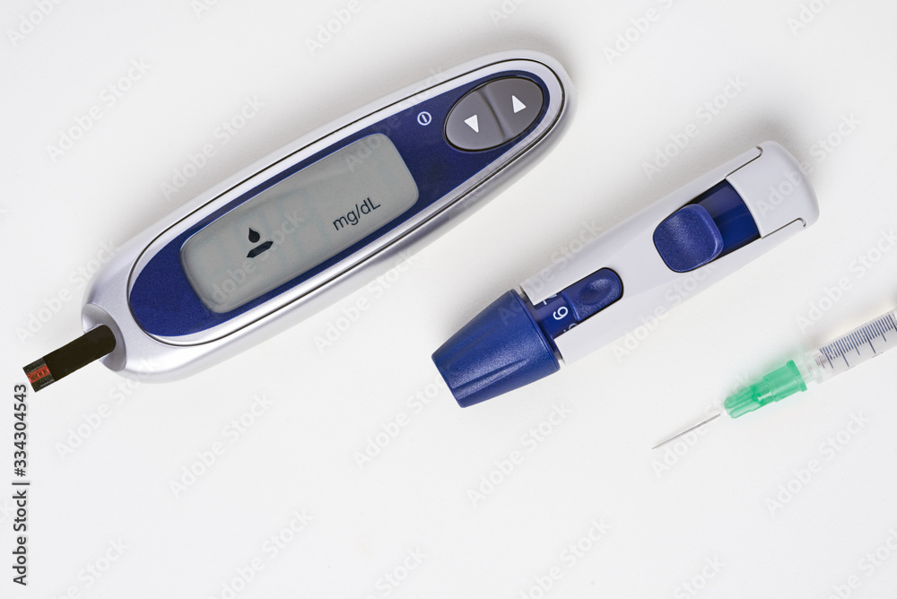diabetes, glucometer with glucose measurement on screen and blood on ...