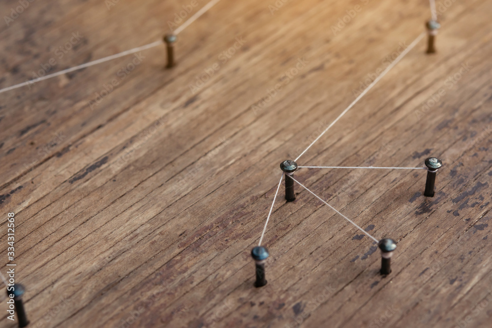 Foto De Connecting Networks Concept Network Connected With Yarn White On Plank Wood With Copy