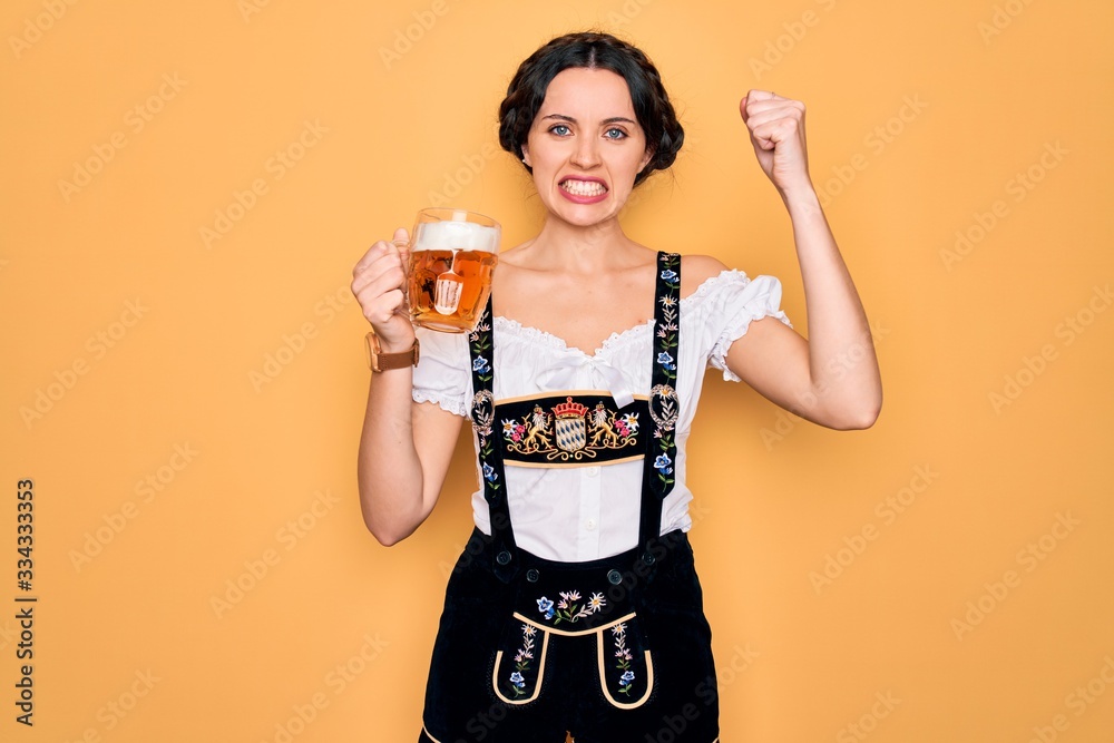 Beautiful german woman with blue eyes wearing traditional octoberfest ...