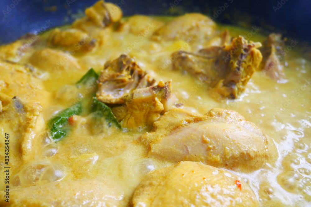 Malaysian Malays traditional cook called Ayam Masak Lemak Chili Padi ...