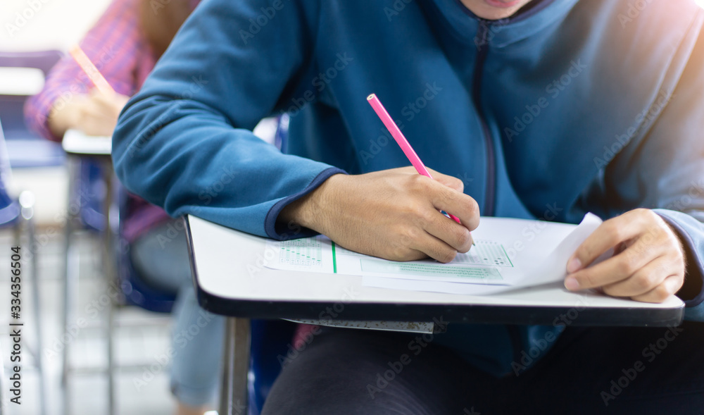 high school,university student study.hands holding pencil writing paper ...