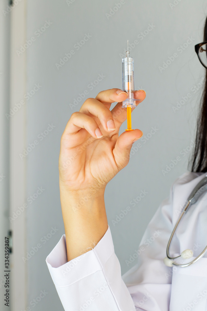 Pandemic Concept , The doctor prepares the syringe for vaccination ...