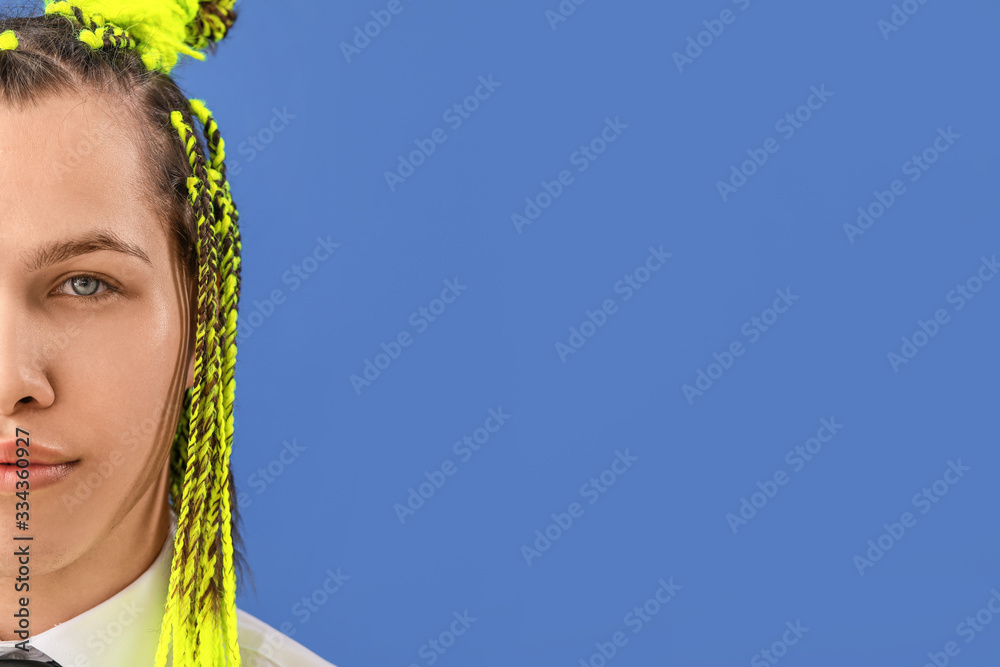 Portrait of young transgender woman on color background Stock Photo ...