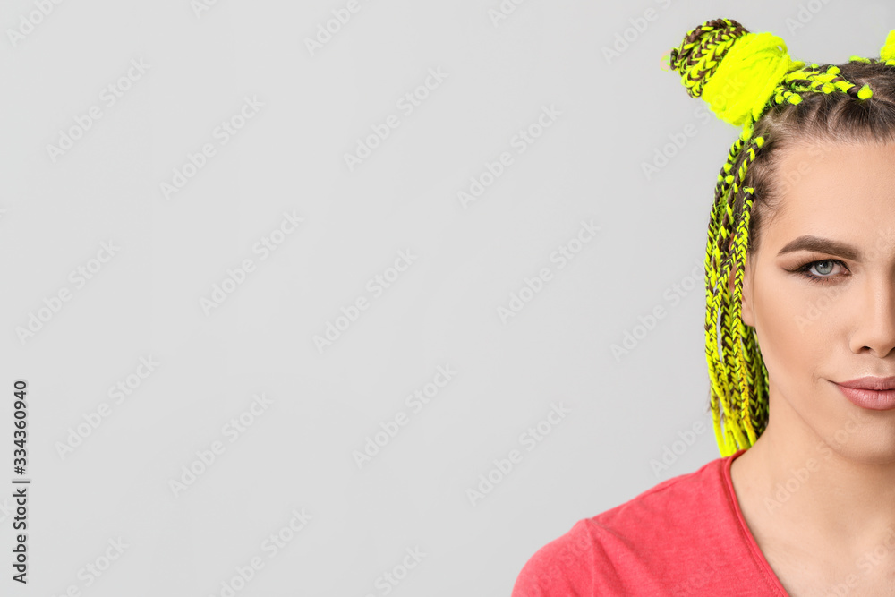 Portrait of young transgender woman on light background Stock Photo ...