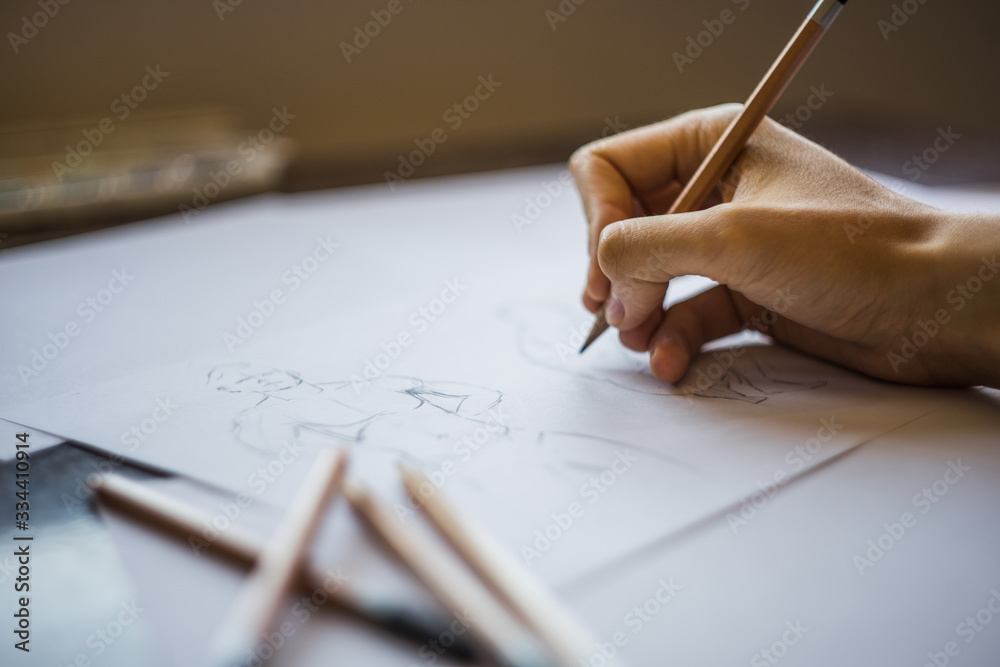 Drawing, sketching the human figure with a pencil Stock Photo | Adobe Stock