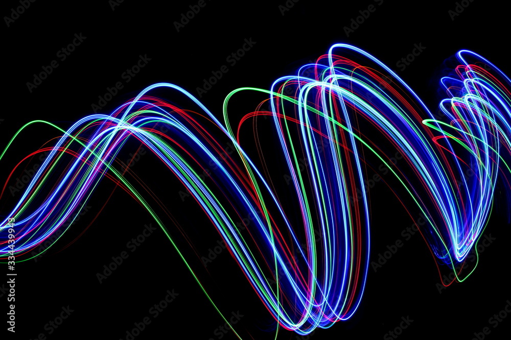 Multi color light painting photography, long exposure photo of electric ...