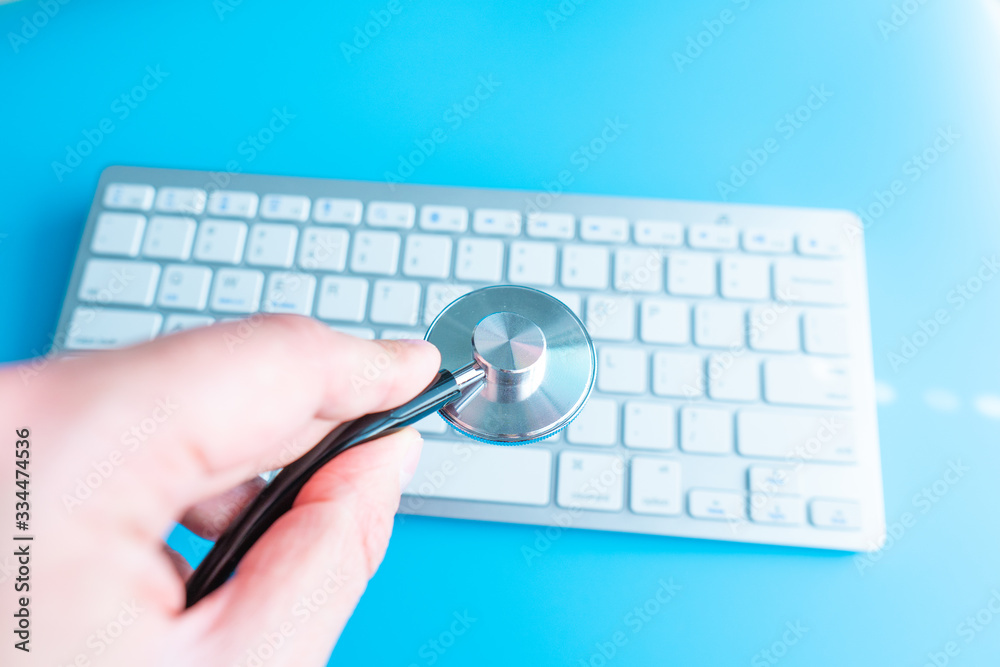 Computer system health or auditing - Stethoscope over a computer ...