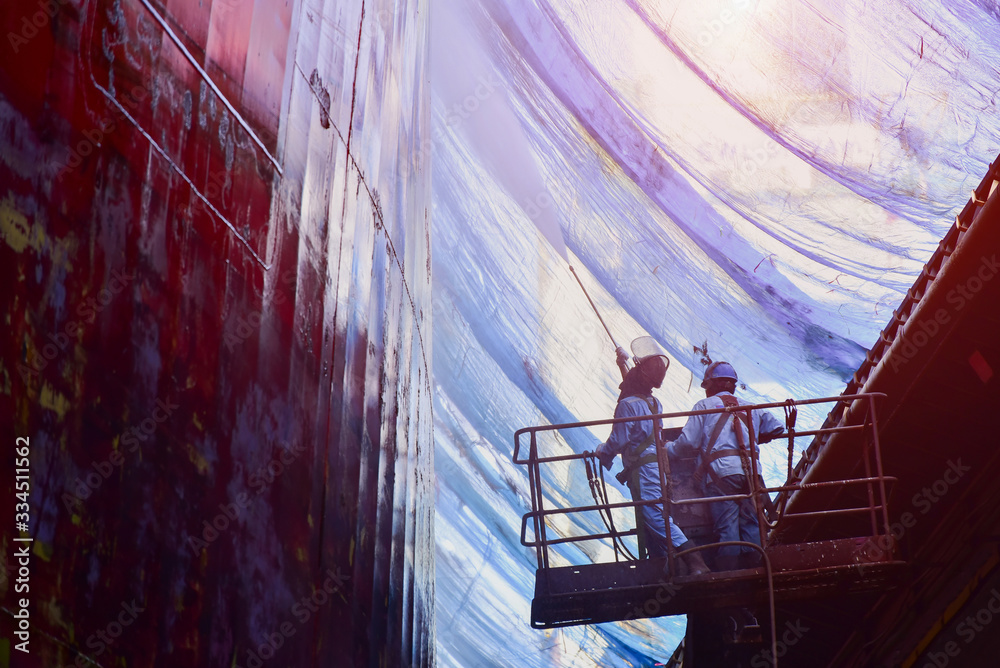 washing and Cleaning cargo ship in shipyard under ship repair in ...
