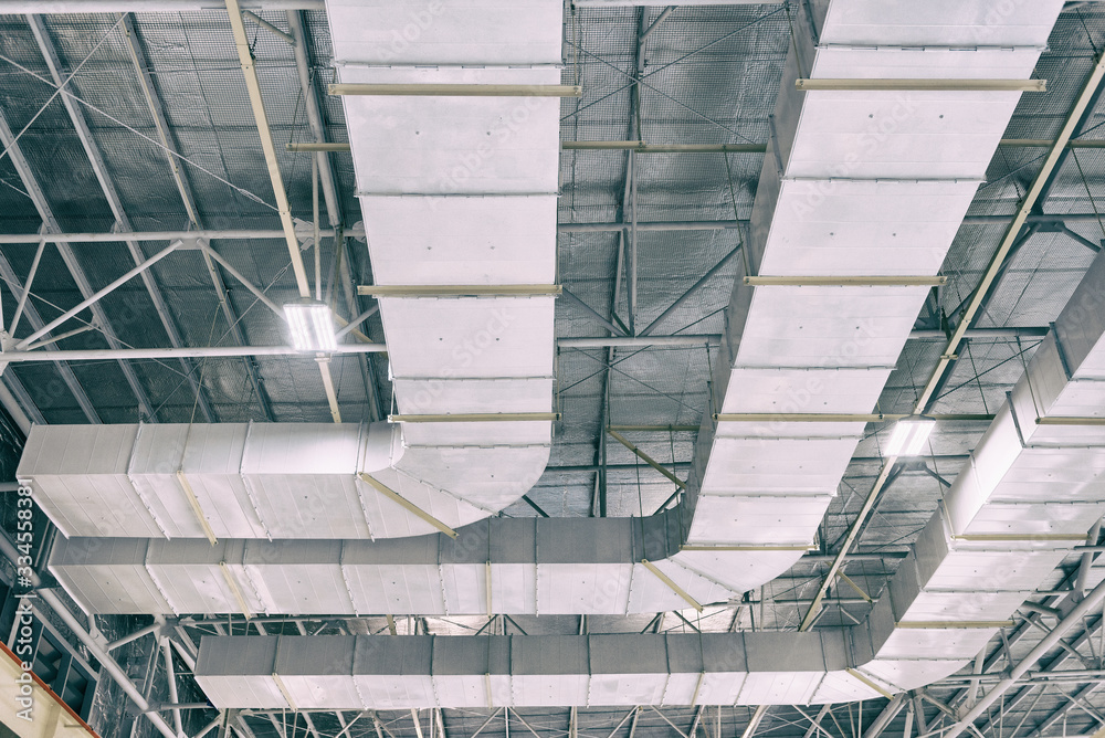 Duct exhaust fan installation under steel roof truss by hanging to ...