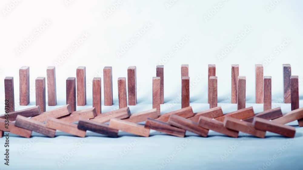 Stop chain reaction. Stopping the domino effect. Rectangular shapes in ...