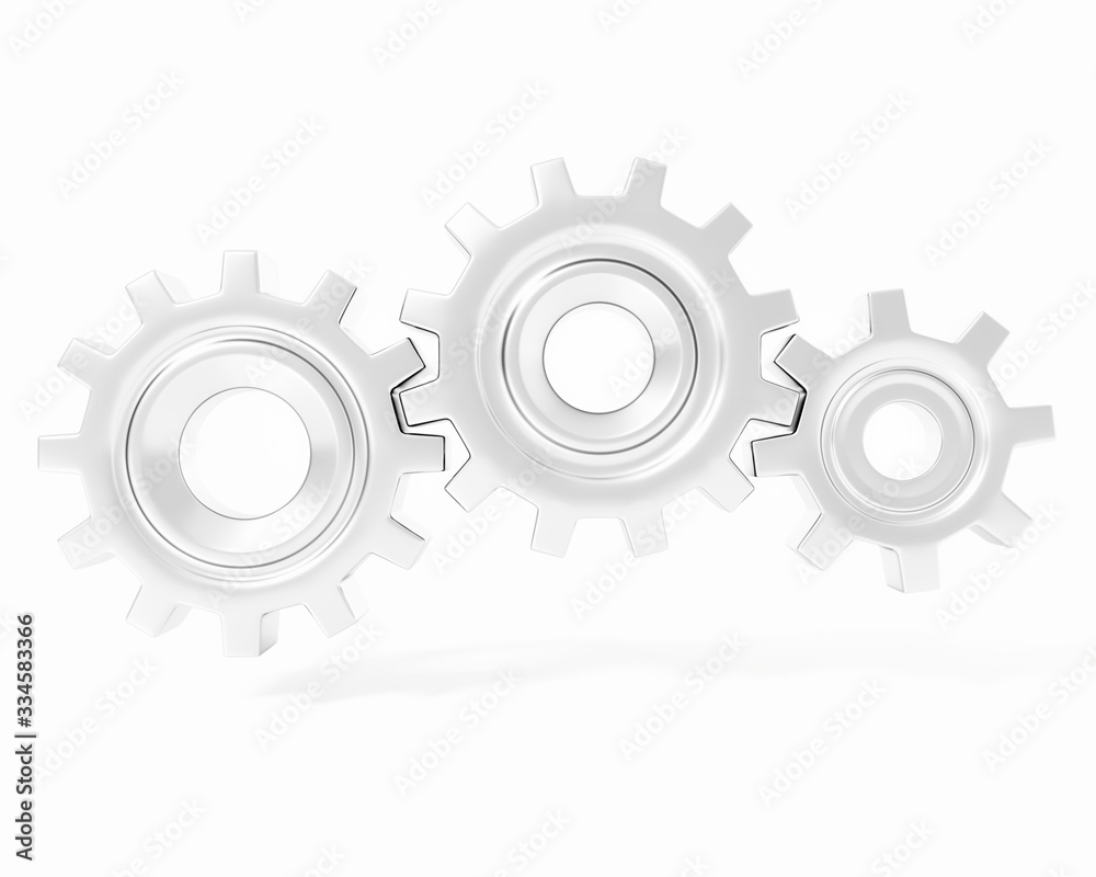 Three connecting metallic gear cogs of different sizes isolated on ...
