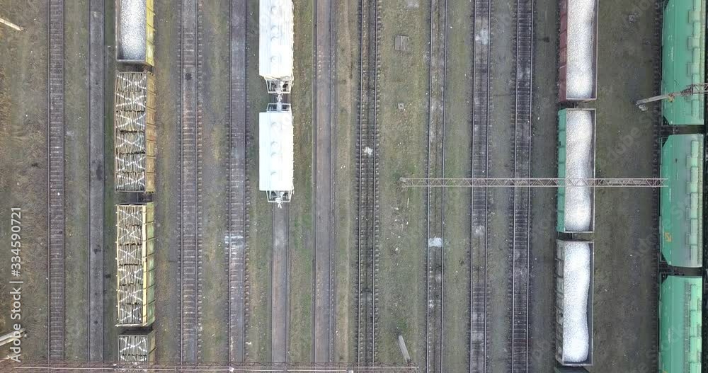 Cargo trains close-up. Aerial view of colorful freight trains on the ...