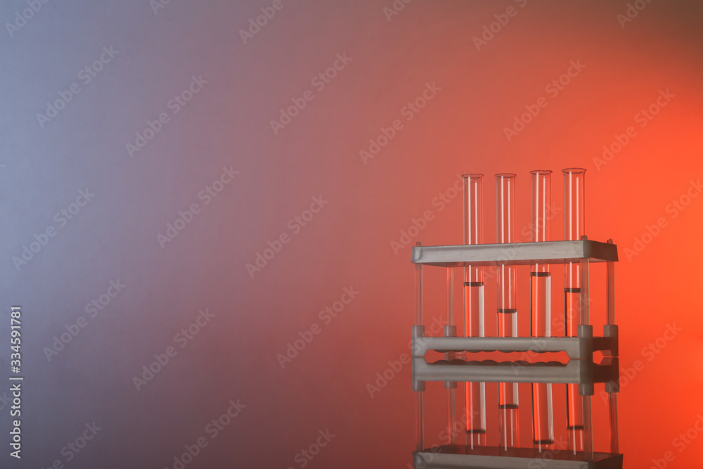 conceptual background with chemical flasks. red backdrop with lab ...