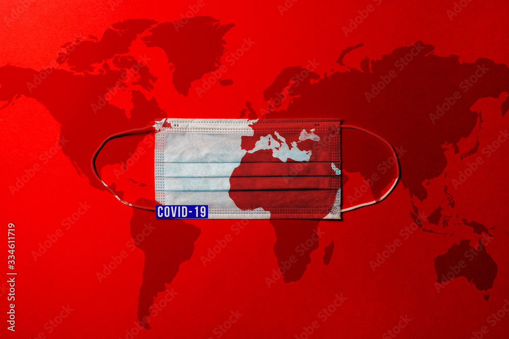 Covid-19. Surgical mask with a red map of the world; Concept of global ...