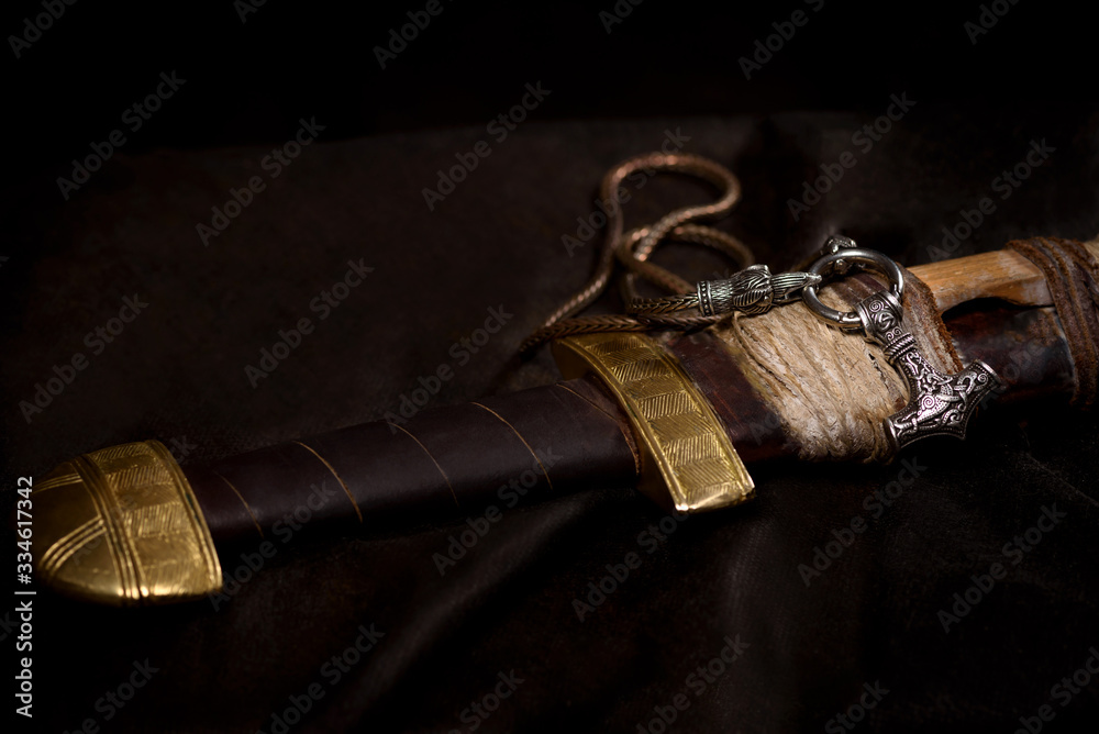 Viking battle sword made of steel with a leather handle with a Thor's ...