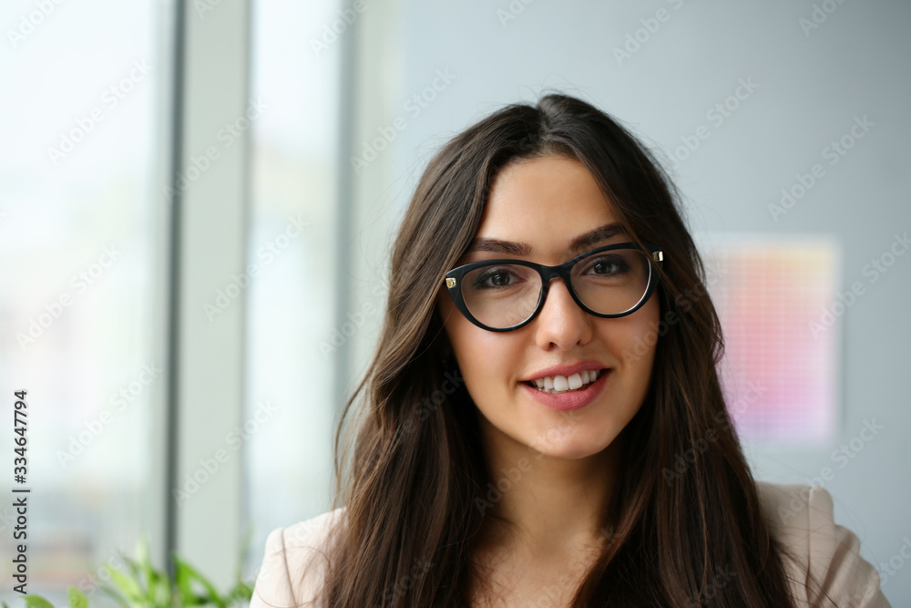 Beautiful smiling girl at workplace look in camera portrait. White ...