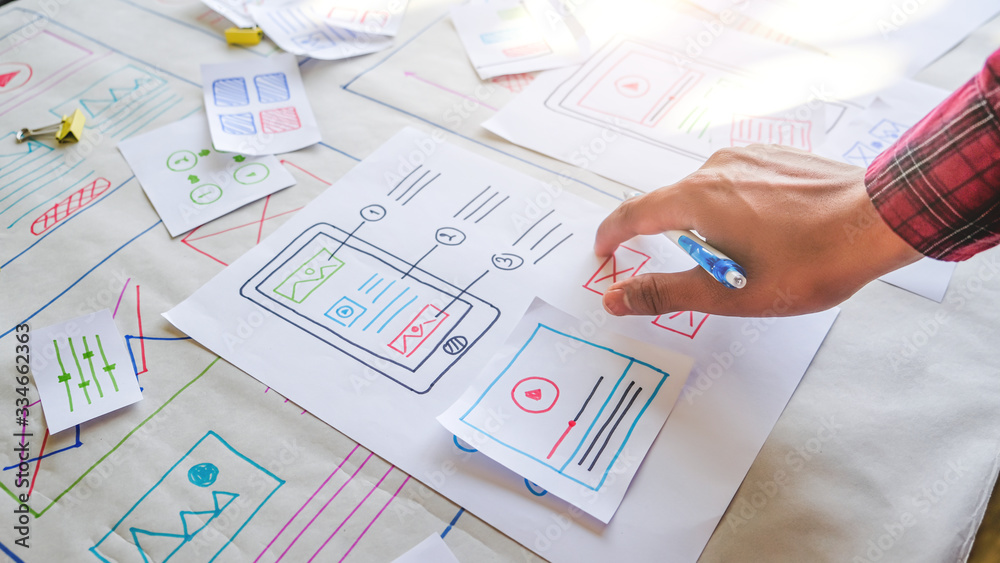 Fotografia do Stock: close up male asian ui/ux designer working and ...