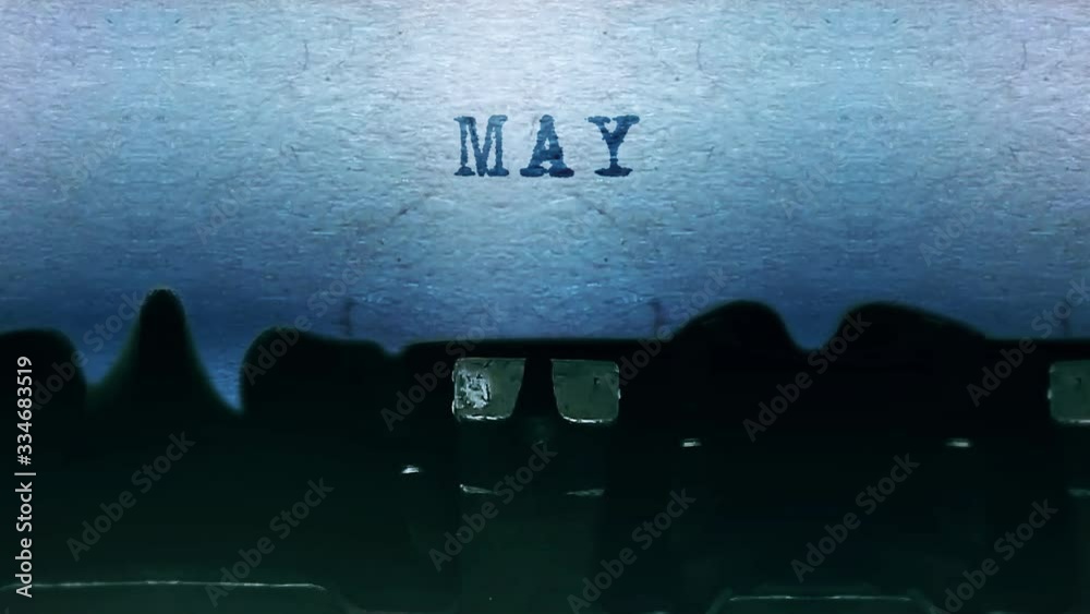 May Word closeup Being Typing and Centered on a Sheet of paper on old ...