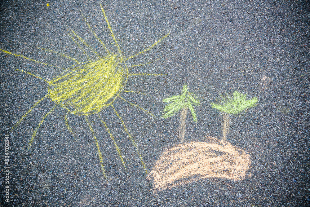 Closeup top view of child's chalk drawing of tropical beach. Blue sea ...