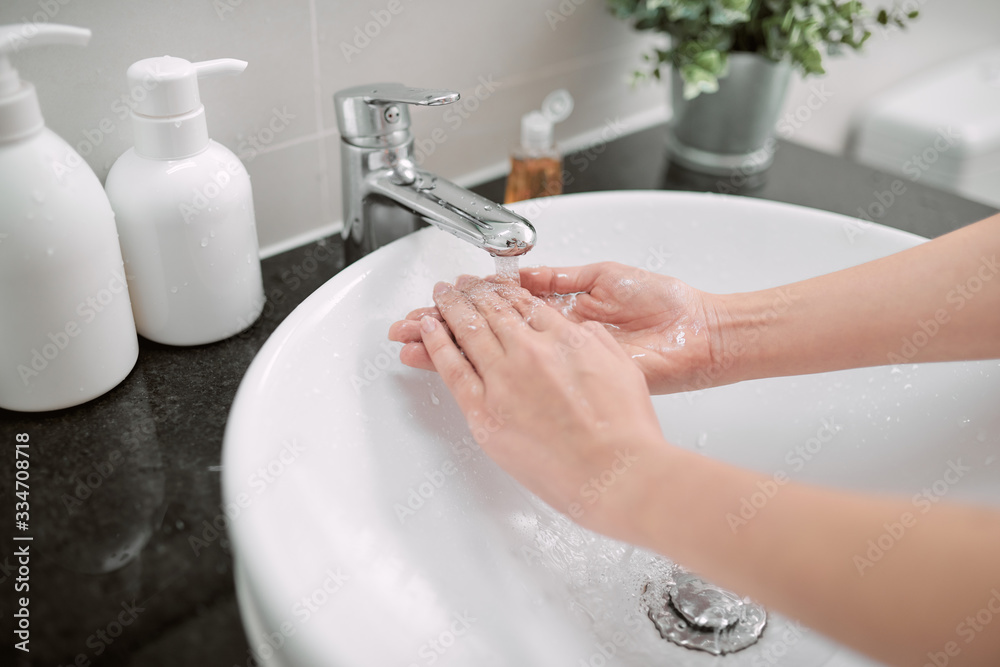 Handwashing. woman washing hands under a tap water,Washing Hands with ...