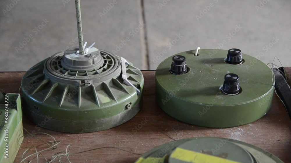 Examples of anti-personnel and anti-tank mines. Explosive device ...