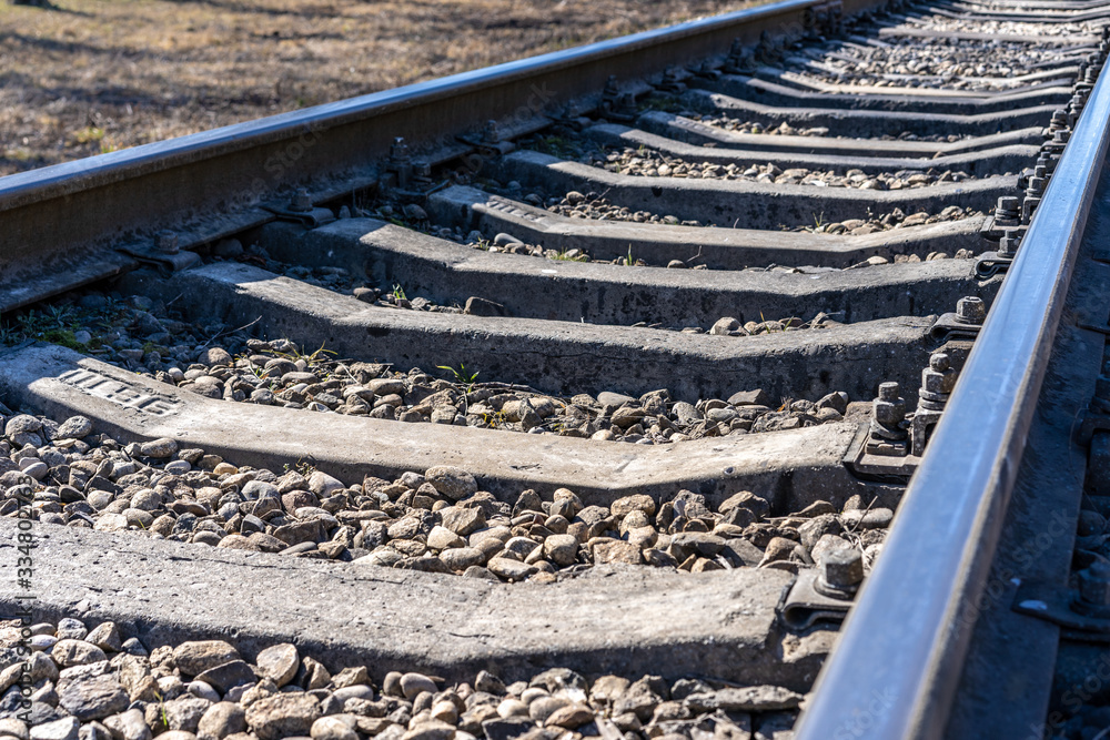 Rail road with sleepers and stones Stock Photo | Adobe Stock