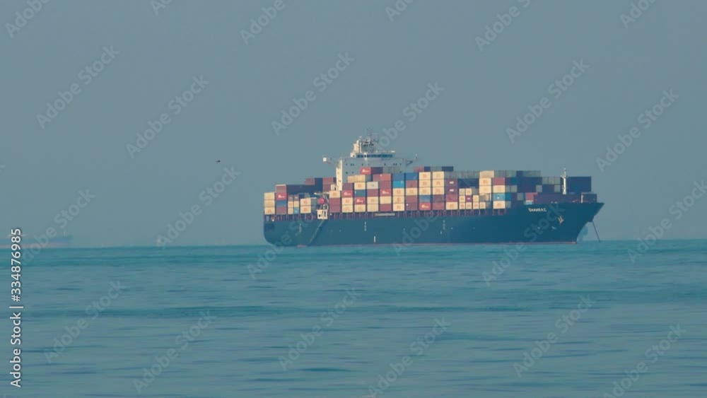Long shot of container cargo ships in the sea of Hormuz strait in ...