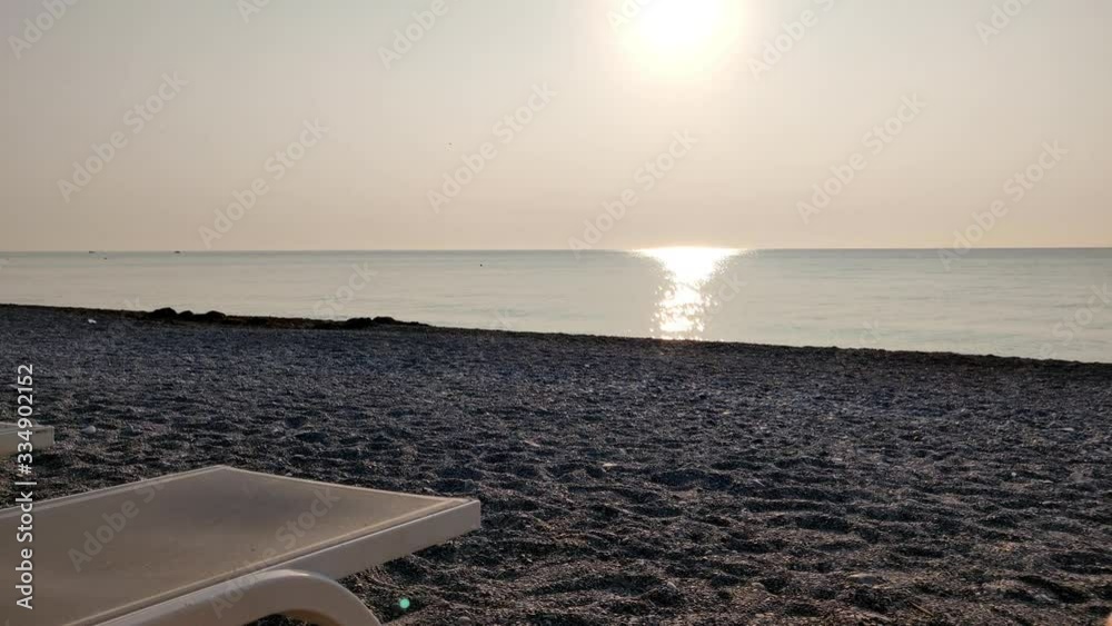 Peaceful beach view without people taken from the beach chair on a ...