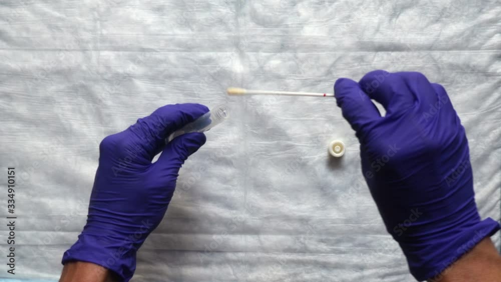 Doctor inserting coronavirus, flu nasal swab sample from a high risk ...