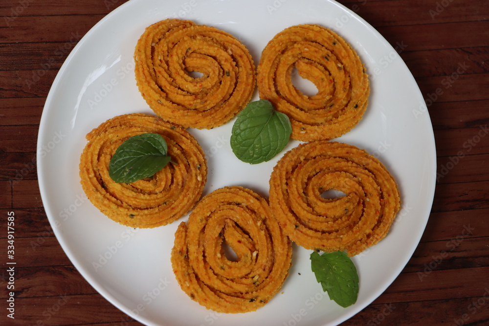 Fotografia do Stock: Indian Traditional Snack Chakali, a spiral shaped ...