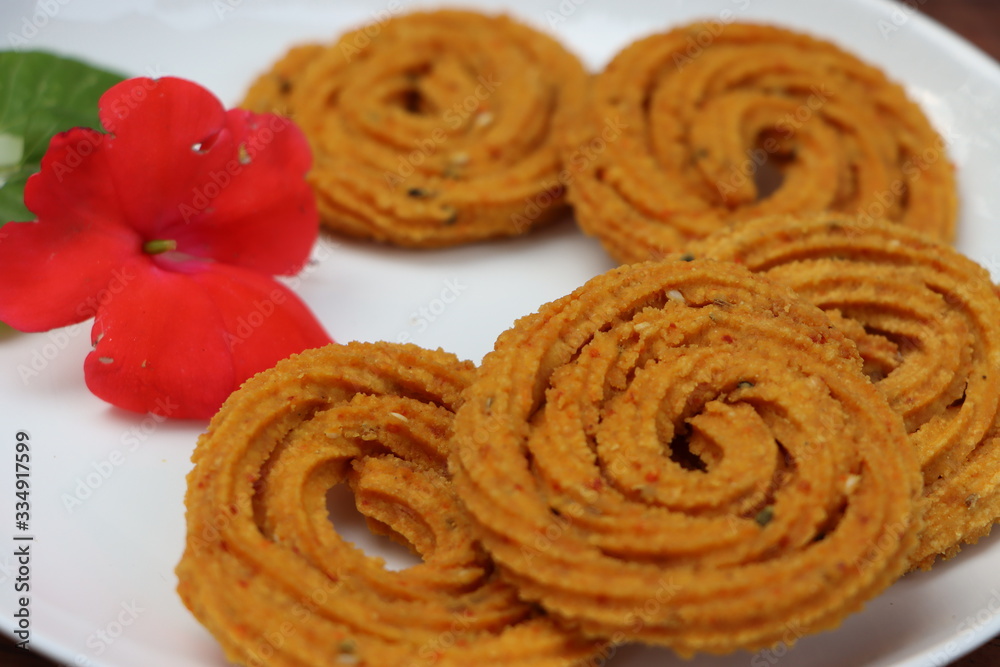 Indian Traditional Snack Chakali, a spiral shaped crisp deep fried ...