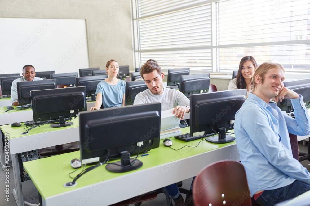 Students and pupils in computer course Stock Photo | Adobe Stock