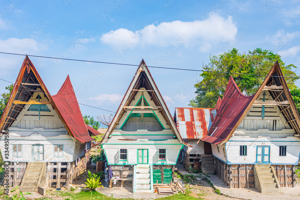 Batak traditional house facade traditional village front view at lake ...