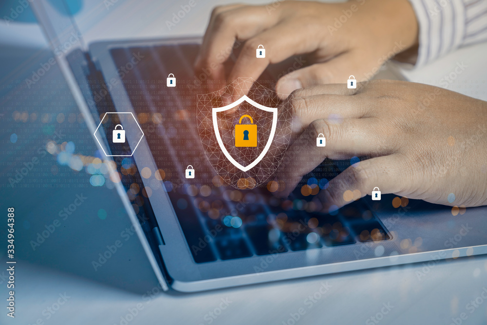 Businessman Using A Laptop Computer With Technology Cyber Security And