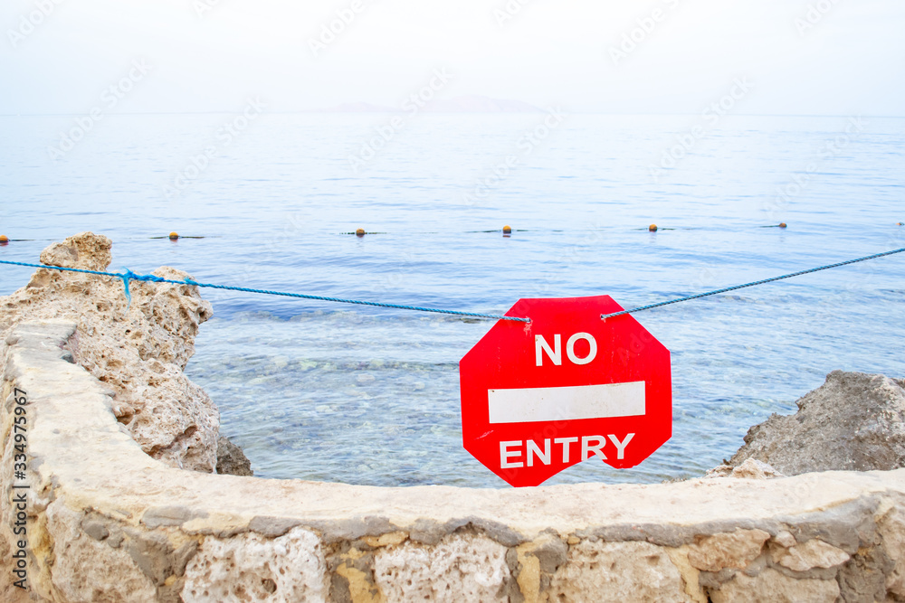 Red "No Entry" sign on the Egypt beach Stock Photo | Adobe Stock