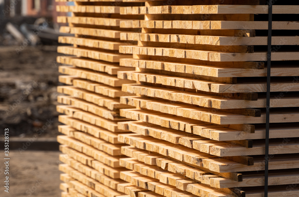 Warehouse for sawing boards on a sawmill outdoors. Timber mill, sawmill ...