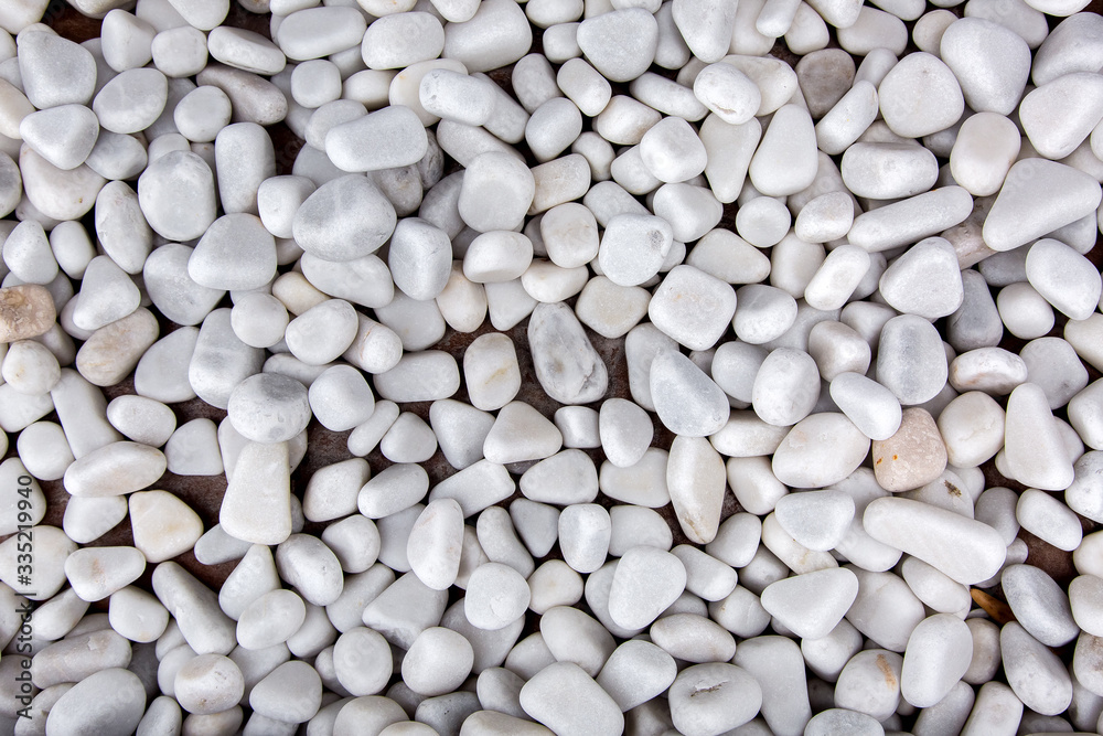 pebble texture white smooth round stone top view close up. Stock Photo ...