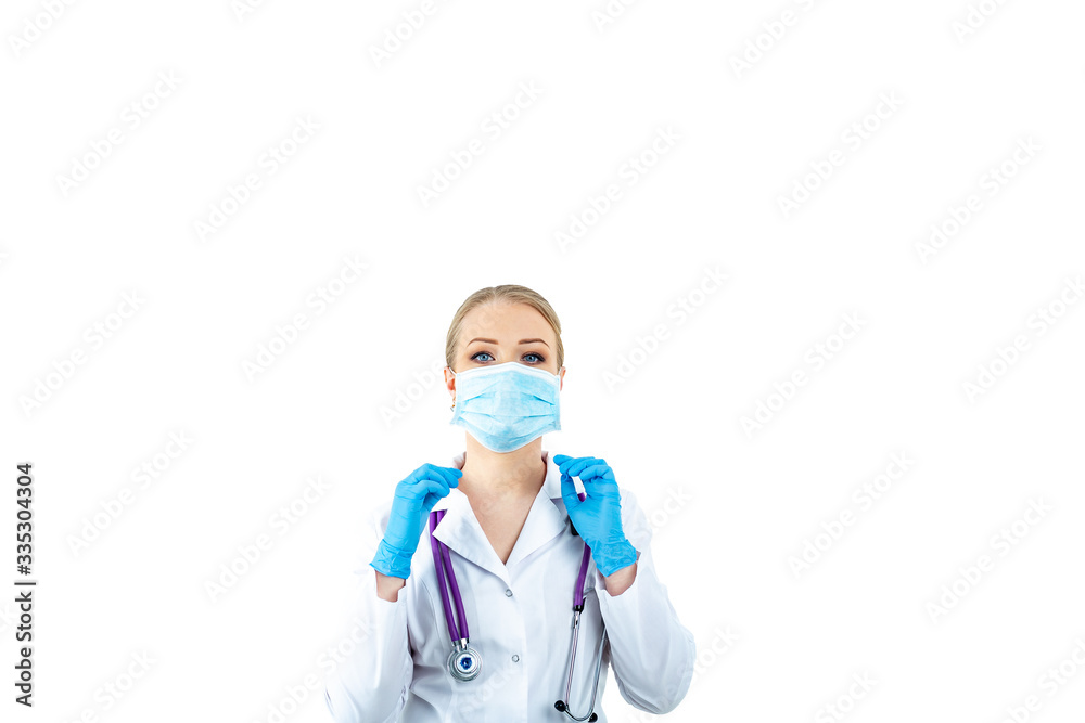 Cute female doctor, nurse puts on a medical face mask, respirator ...