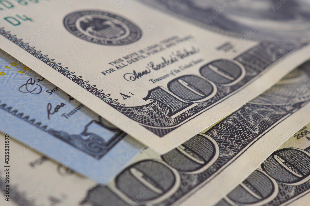 US money banknotes of 100 dollars old and new type close-up. American ...