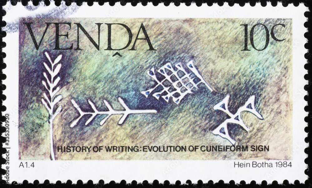 Evolution of cuneiform sign on postage stamp Stock Photo | Adobe Stock