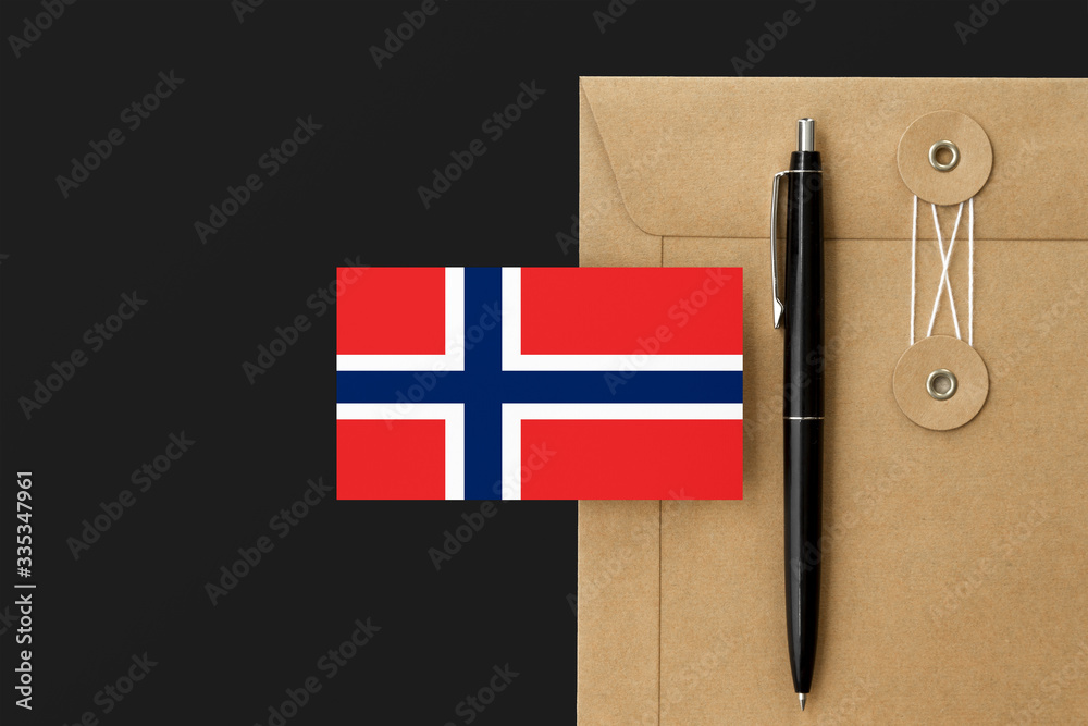 Norway flag on craft envelope letter and black pen background. National ...