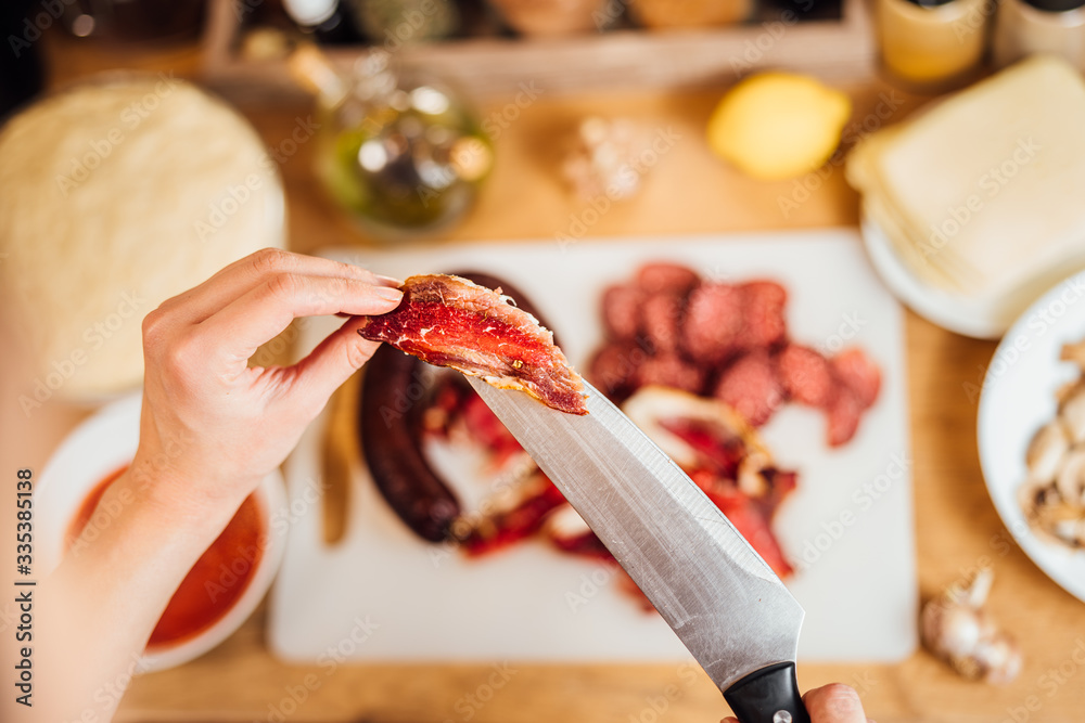 Homemade dry-cure smoked spicy beef prosciutto.Thin slices delicatessen ...