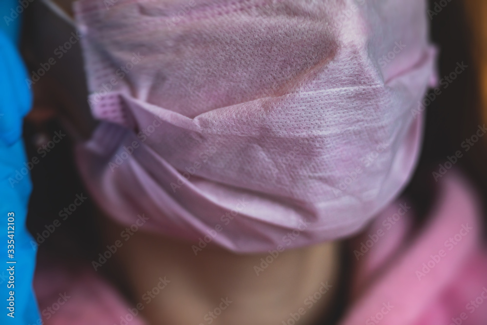 View of different coloured medical forensic face respirator mask, pink ...
